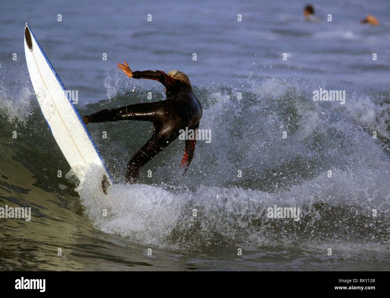 Man surfing wave in ocean Stock Photo - Alamy
