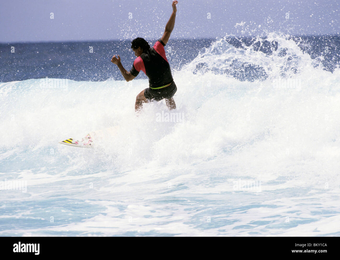 Man surfing in ocean Stock Photo - Alamy