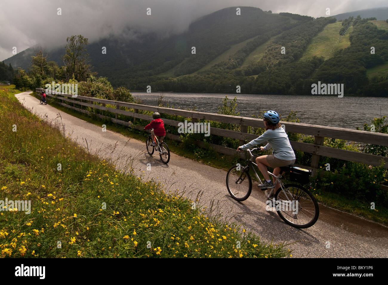 Mom and son biking along the Franconia Notch Bike Trail Stock Photo - Alamy