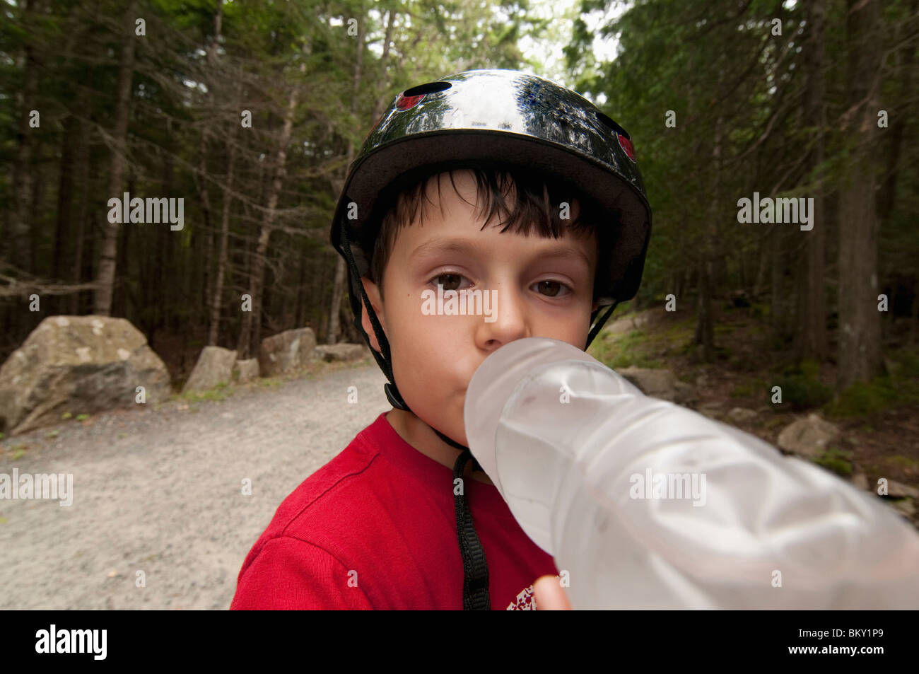 Taking a break and a drink during a long bike ride on the carriage ...