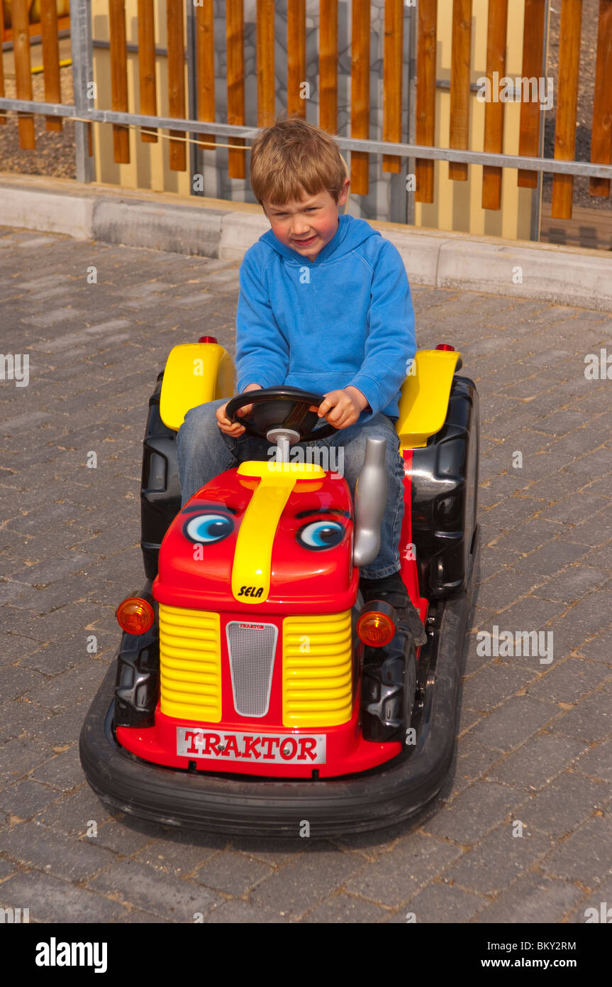 Boy on tractor hi-res stock photography and images - Alamy