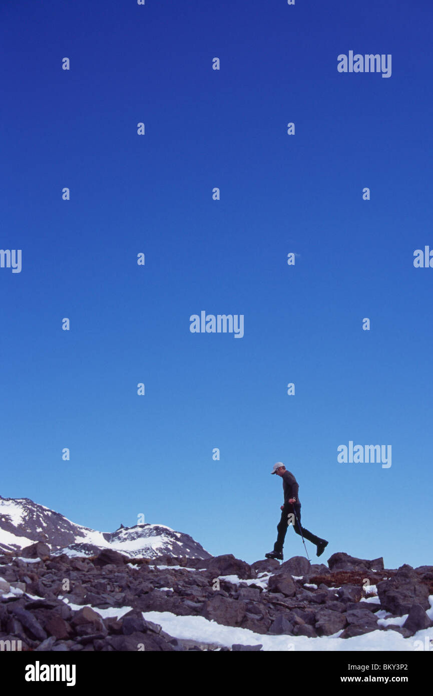 Man on mountain ridge blue sky hi-res stock photography and images - Alamy
