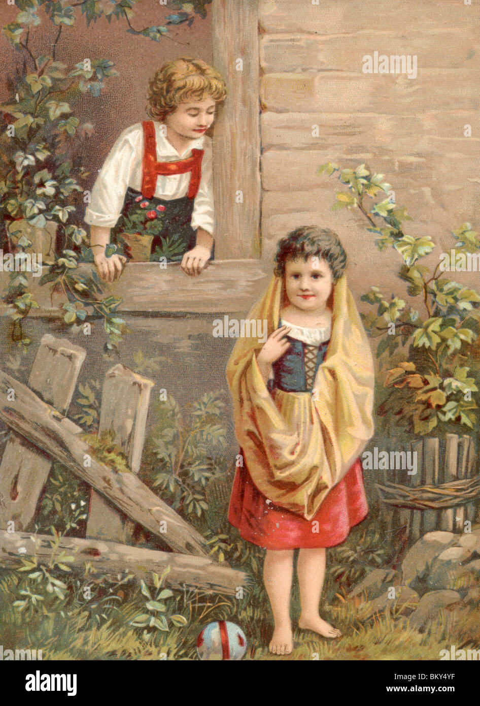 Two Young Children Play Ball in the Garden Stock Photo - Alamy