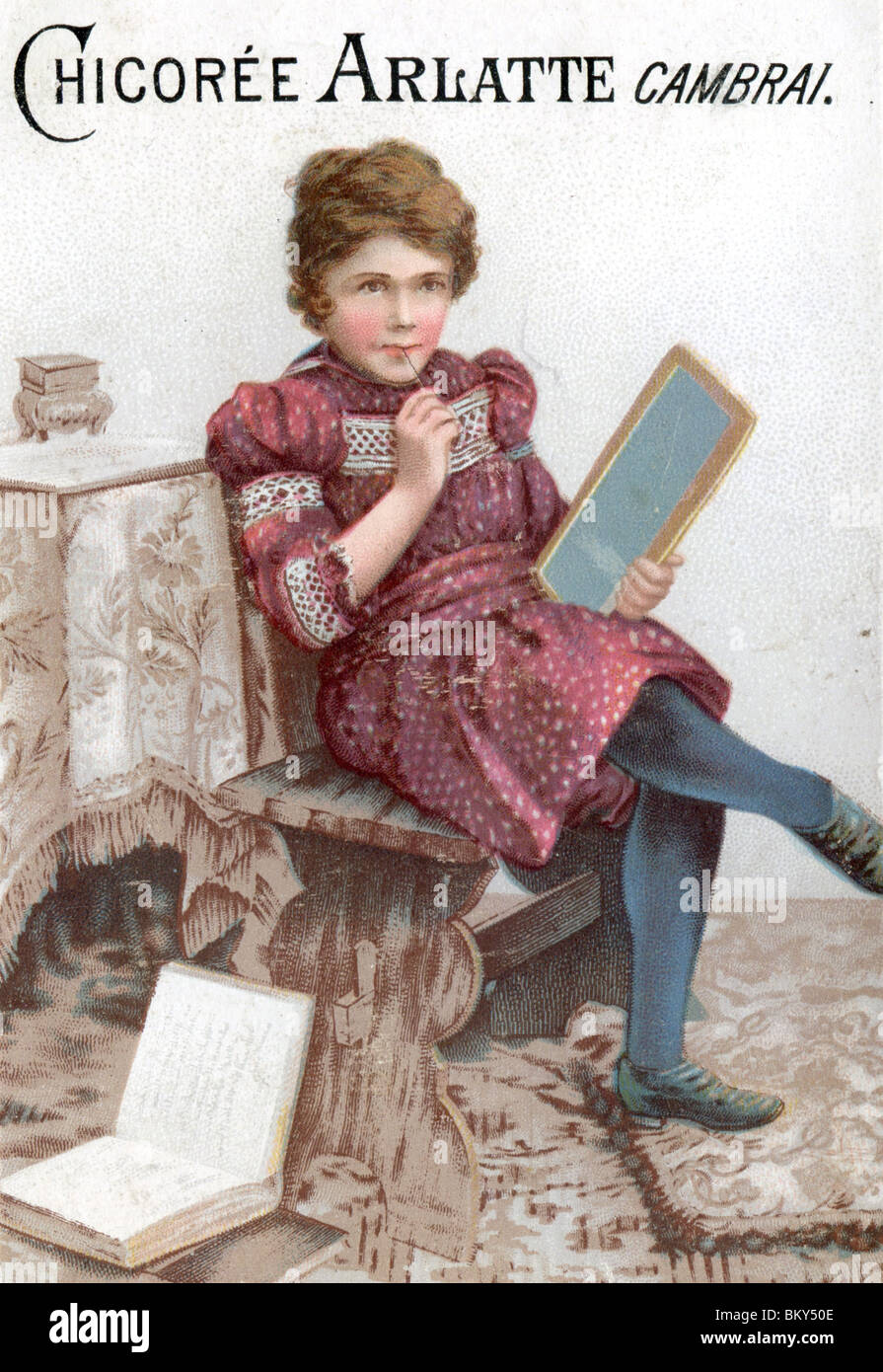 Young Girl Concentrating on Her Writing Stock Photo - Alamy