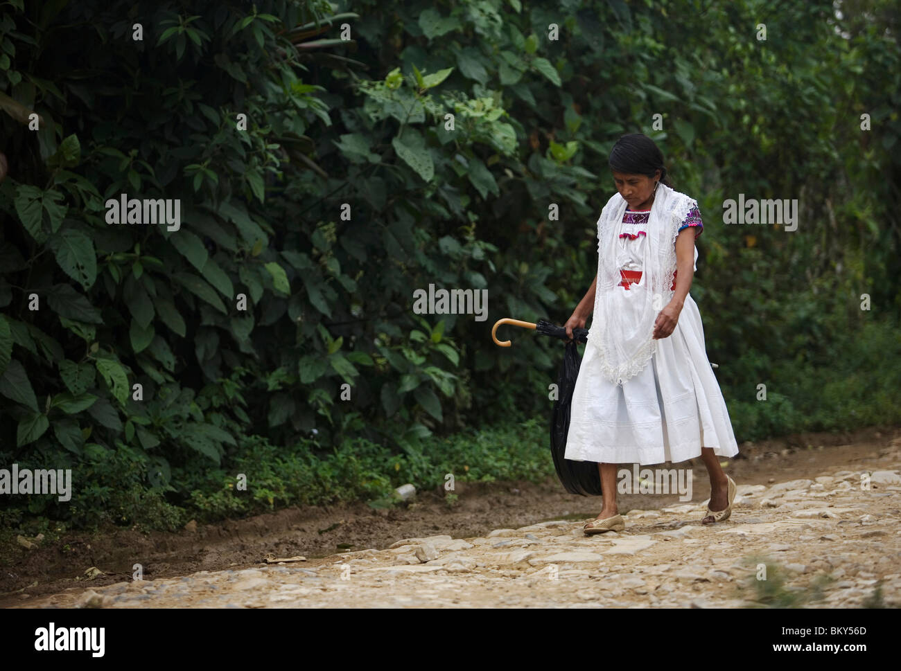 A woman walks in Yohualichan on the outskirts of Cuetzalan del Progreso ...