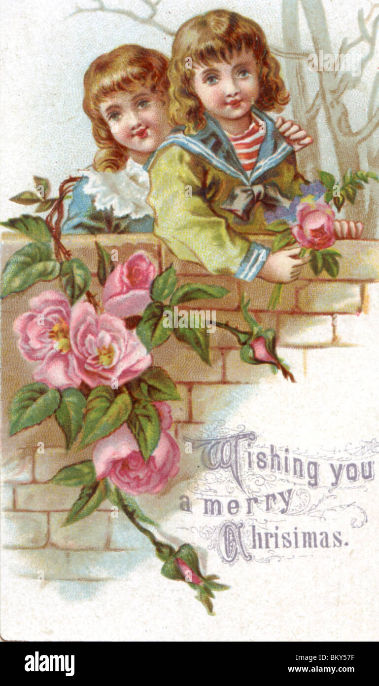 Children bringing Christmas Greetings Stock Photo - Alamy