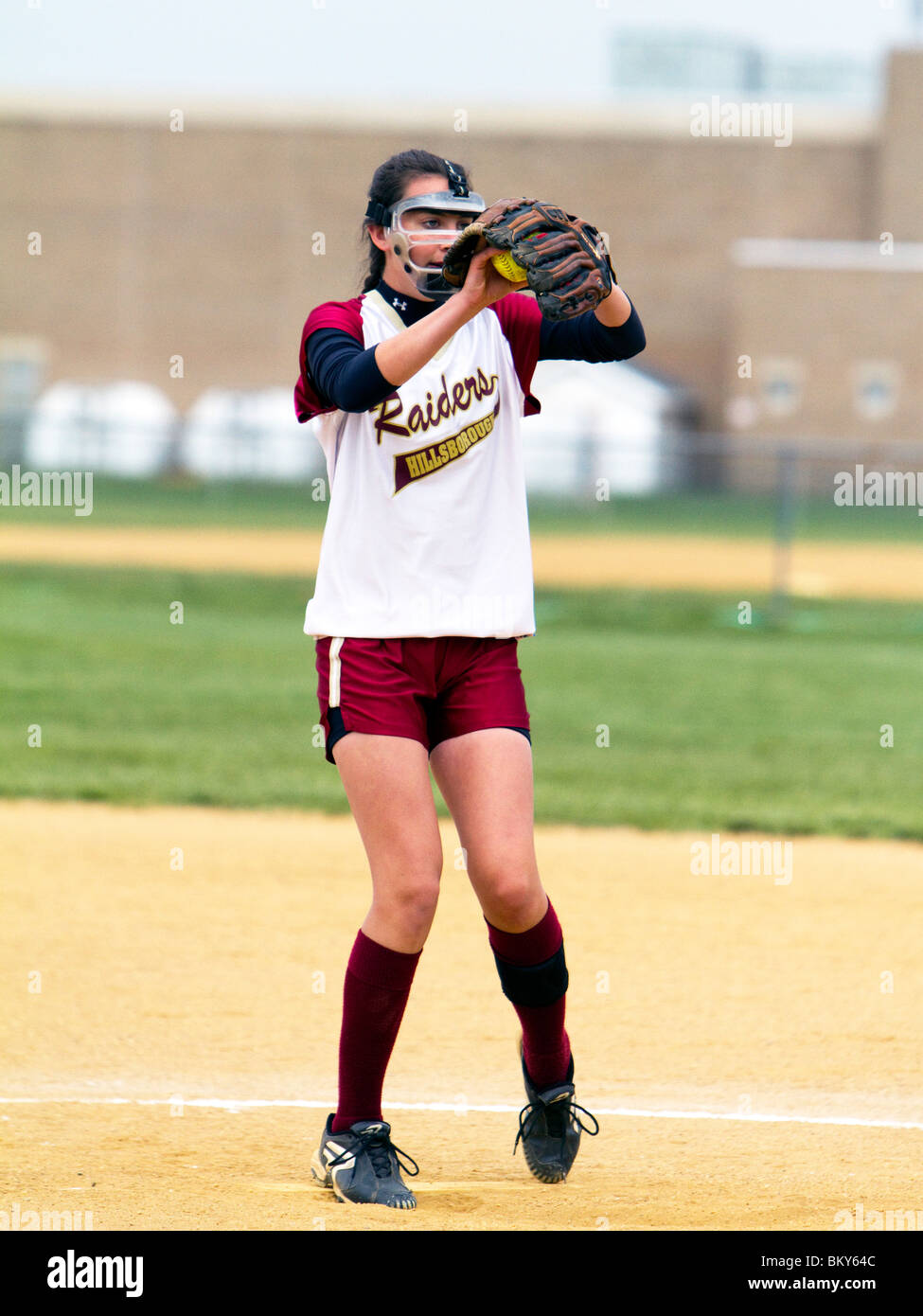 Girls high school softball pitcher in her delivery Stock Photo - Alamy