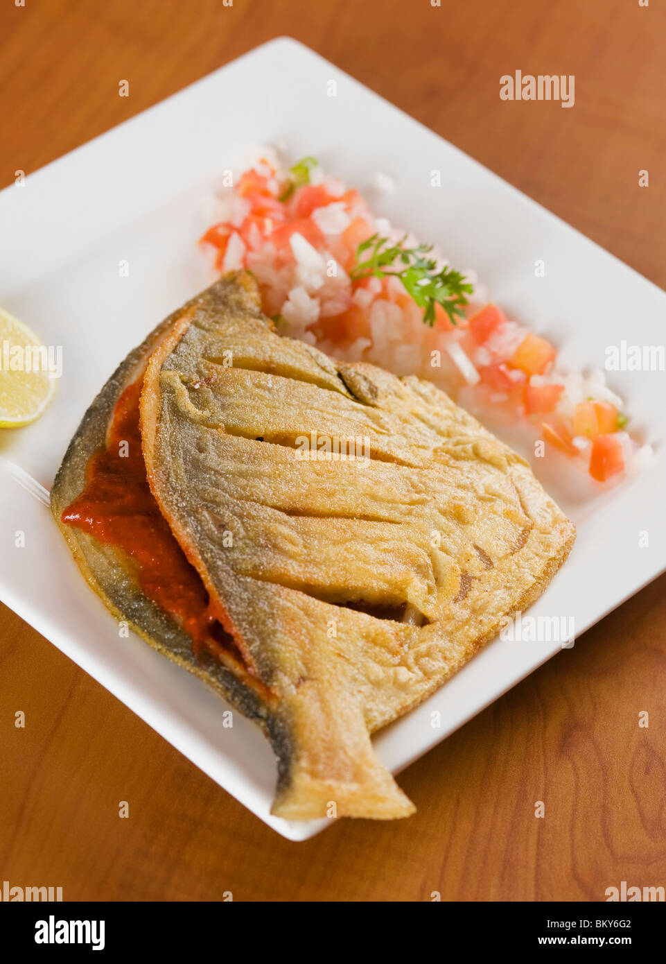 Fried pomfret fish hi-res stock photography and images - Alamy