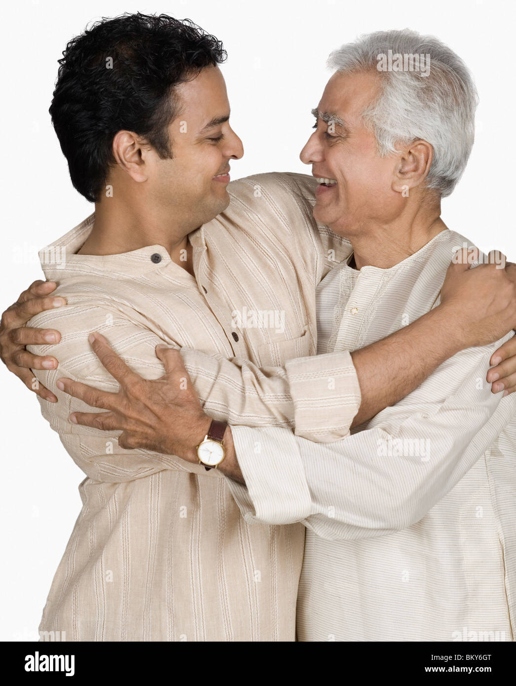 Man hugging his son Stock Photo - Alamy