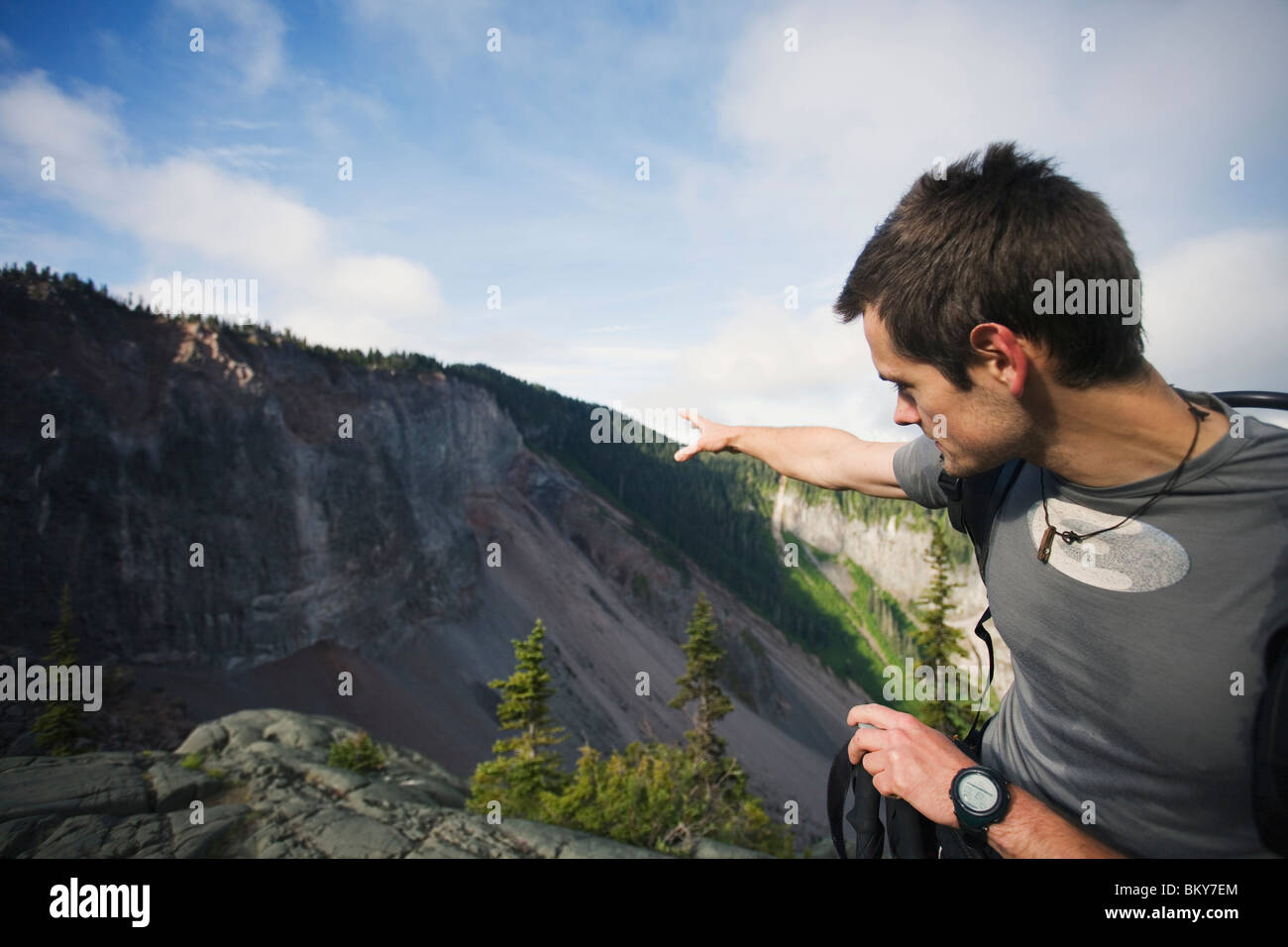 A man explains the landslide hazard potential from The Barrier, an ...