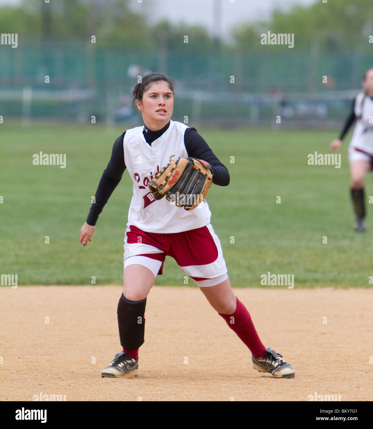 Girls high school softball. Catching running throwing. Teenage girls ...