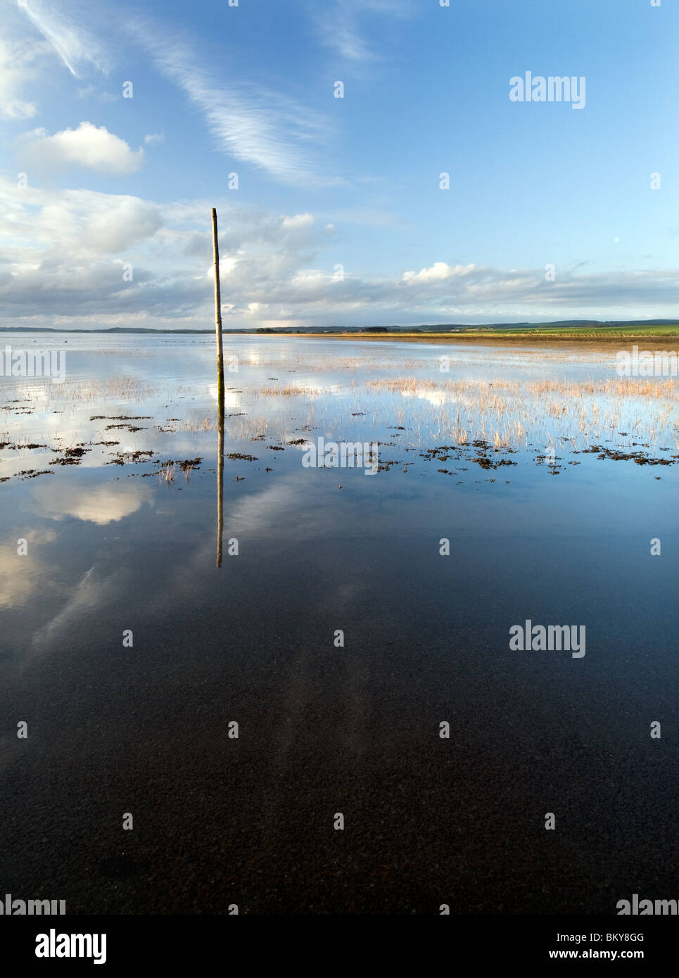 One of the Pilgrims Way Marker Posts on Lindisfarne Causeway Stock ...