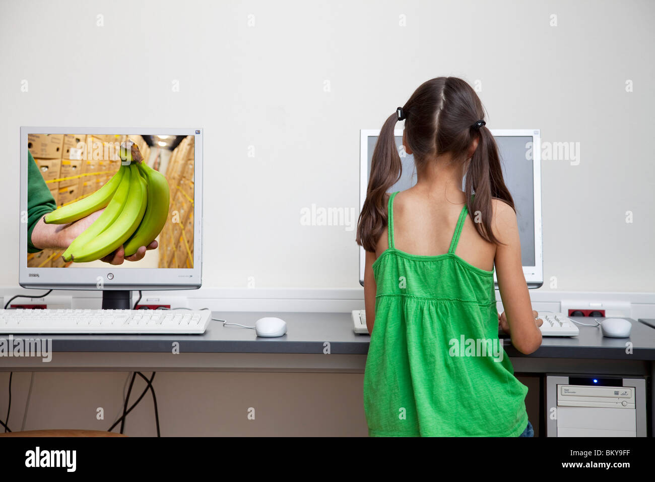 Schoolgirl using computer, Hamburg, Germany Stock Photo - Alamy