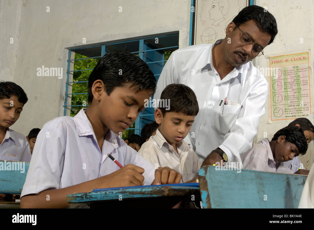 Indian rural teacher man teaching hi-res stock photography and images ...