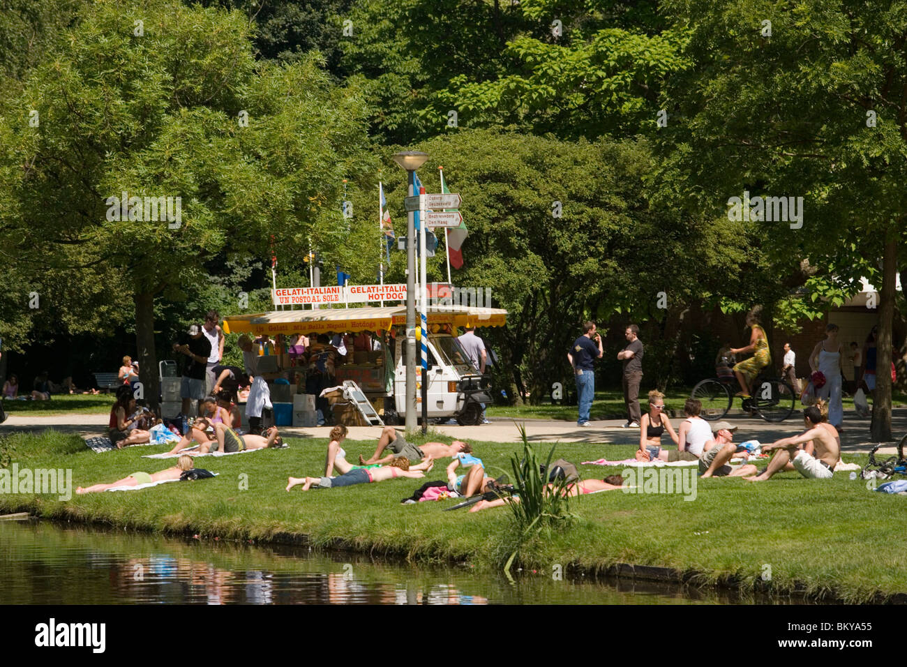 People, Meadow, Icecream, Vondelpark, People relaxing on meadow in ... People, Meadow, Icecream, Vondelpark, People relaxing on meadow in ...