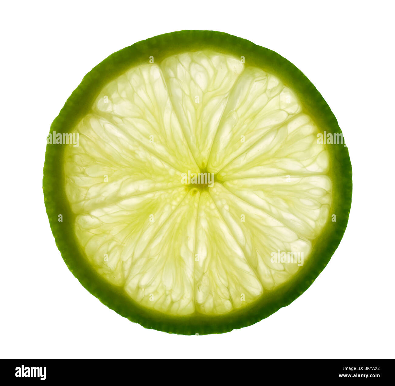 A single slice of lime, isolated against white as a cutout Stock Photo ...