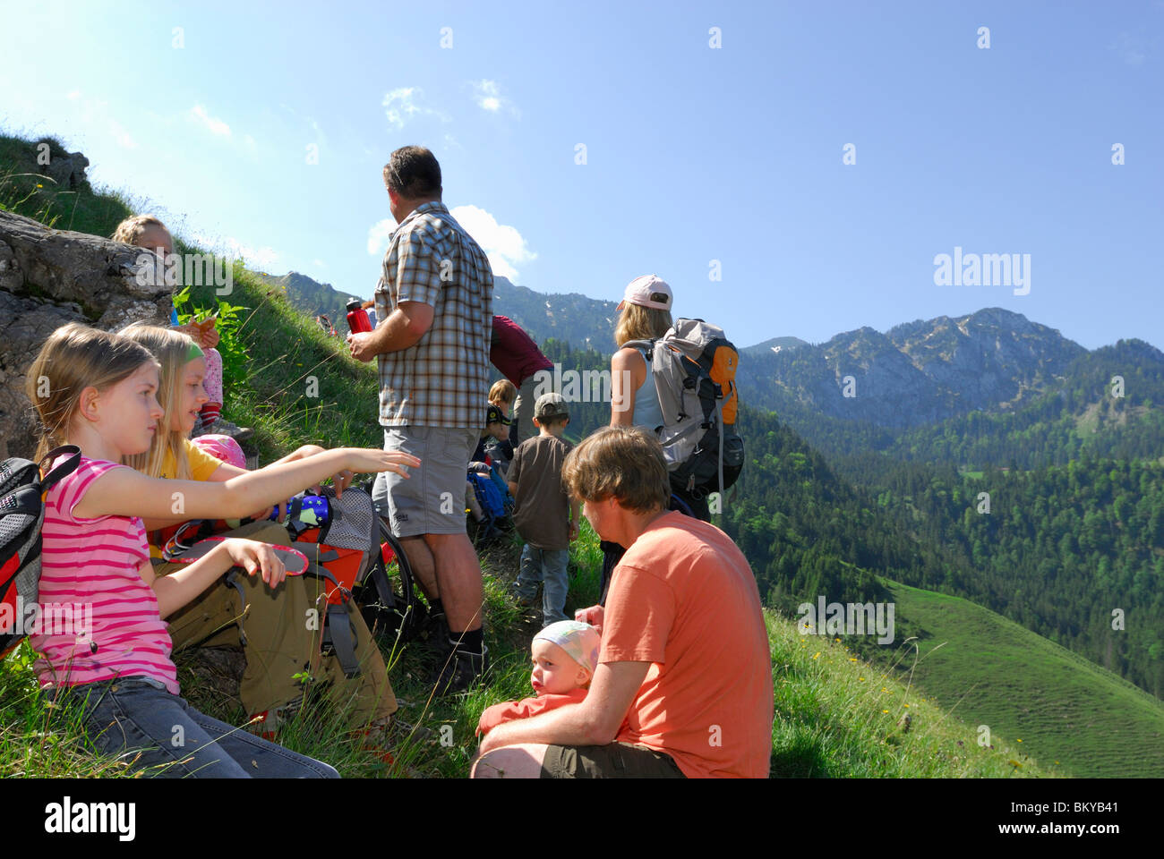 Group of hikers with children resting, Bavarian Alps, Upper Bavaria ...