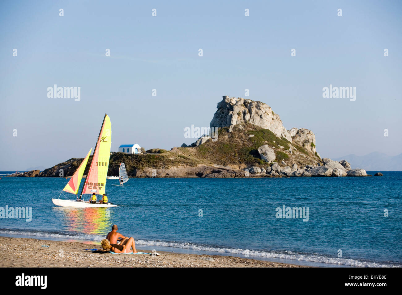 Catamaran in front of Kastri island with capel St. Nicholas, bay of ...