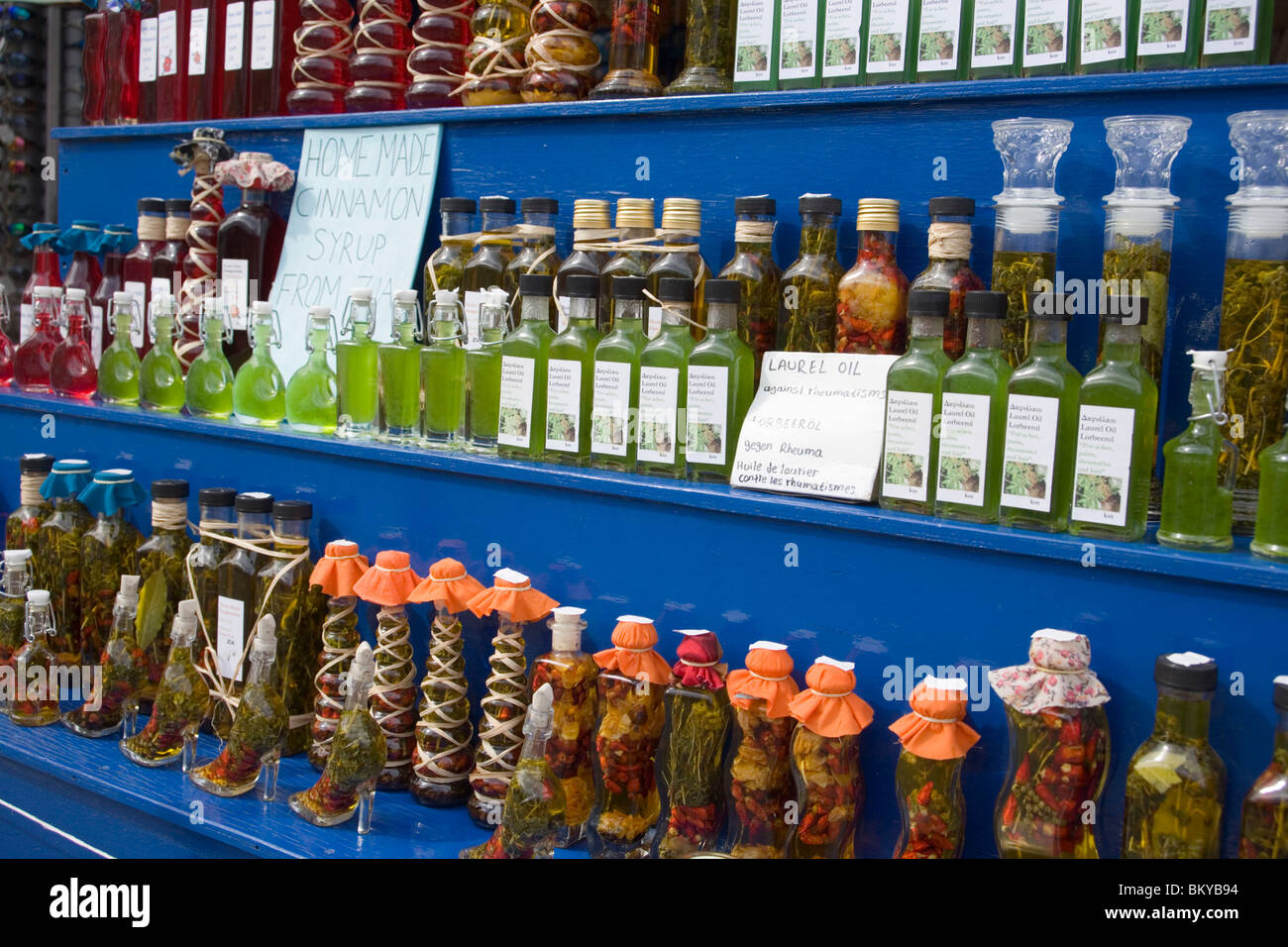 Different bottles with oil and syrup in a souvenir shop, Zia, Kos ...