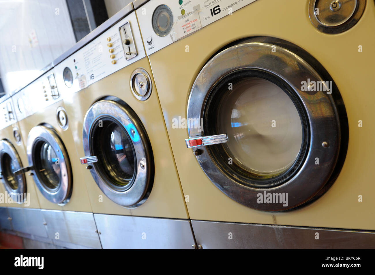 Washing machine at launderette England Uk Stock Photo - Alamy