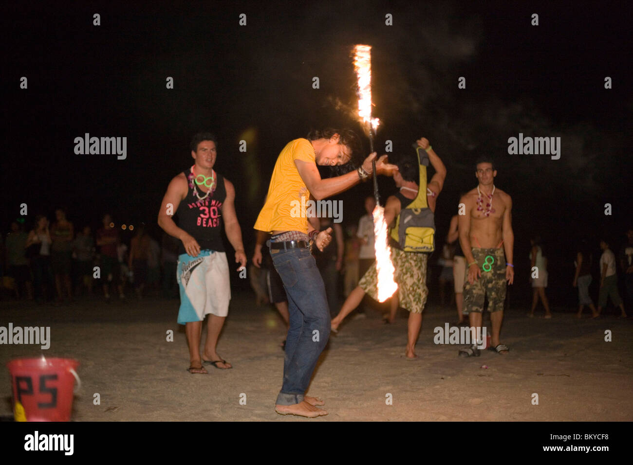 Young man juggeling with fire, Full Moon Party, Hat Rin Nok, Sunrise ...