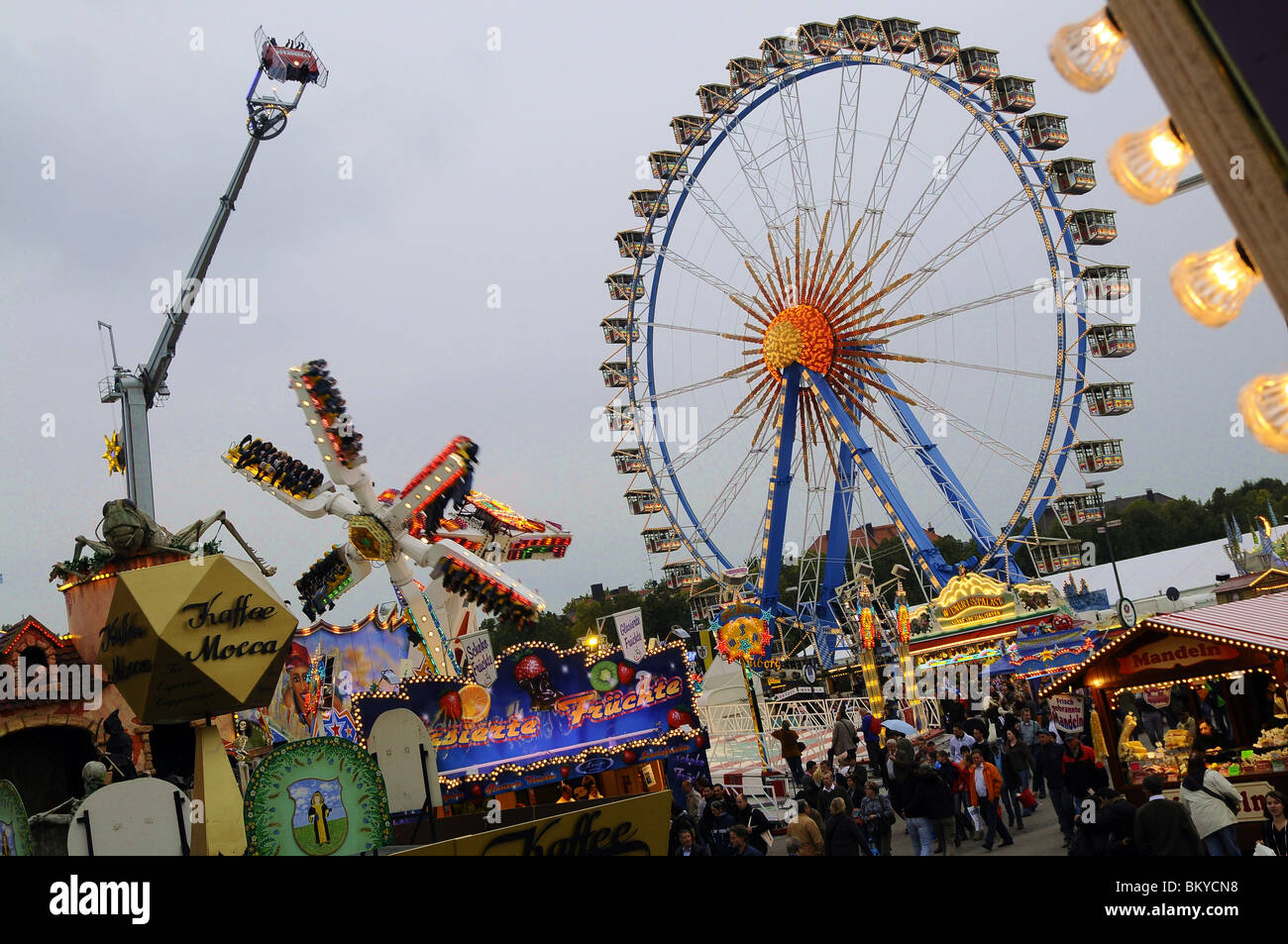 Ferris wheel and fun rides at the Oktoberfest, Munich, Bavaria, Germany ...