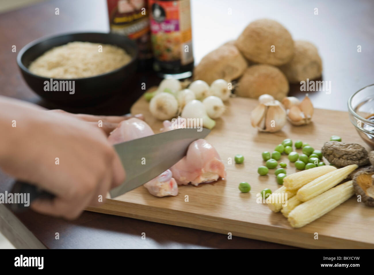 Woman hand cutting corn hi-res stock photography and images - Alamy