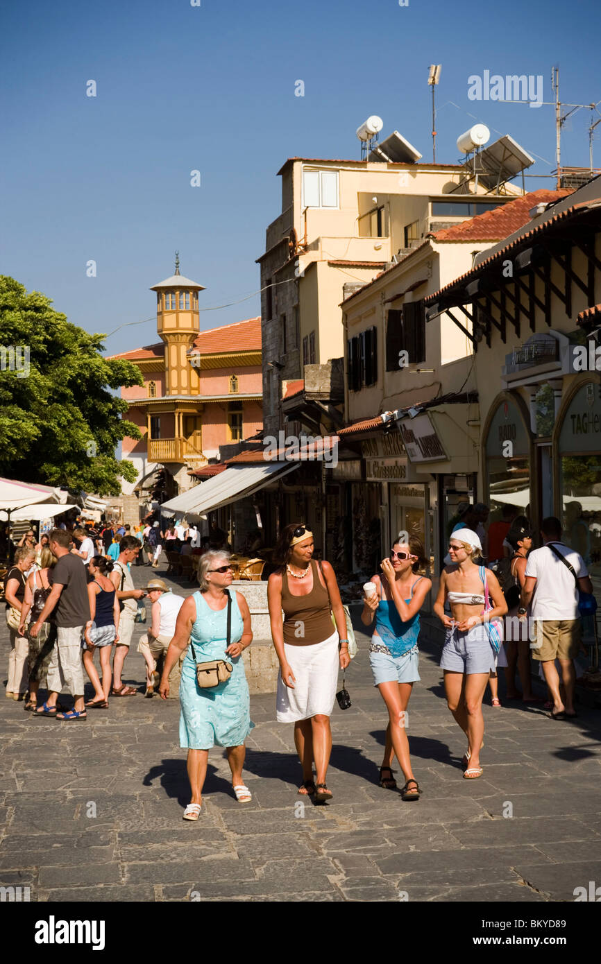 Women strolling over shopping street Odos Sokratous, Rhodes Town ...