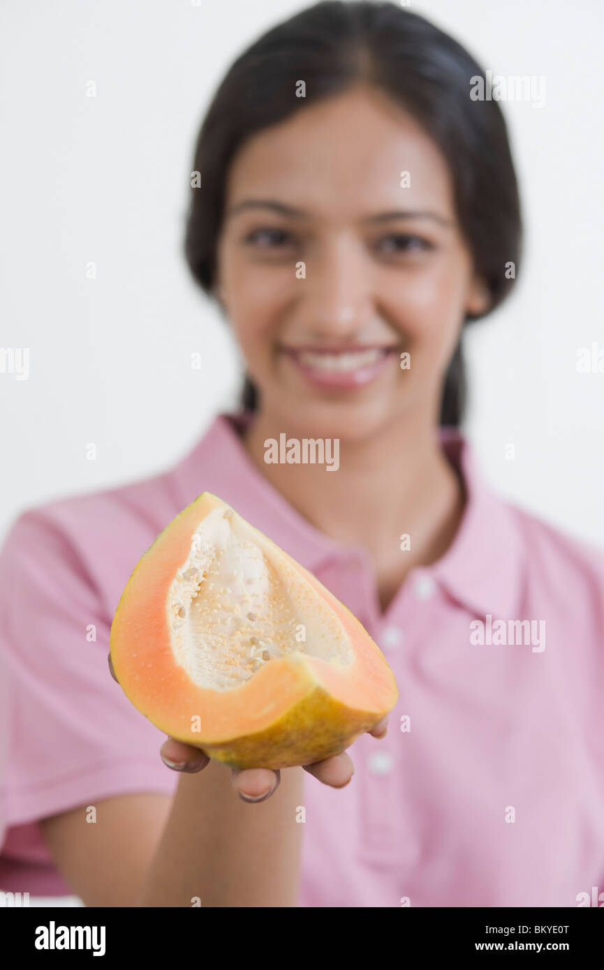 Woman papaya looking at camera hi-res stock photography and images - Alamy