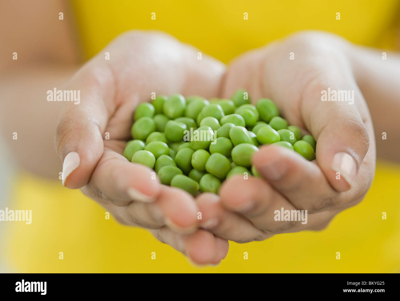 Close up woman holding pea hi-res stock photography and images - Alamy