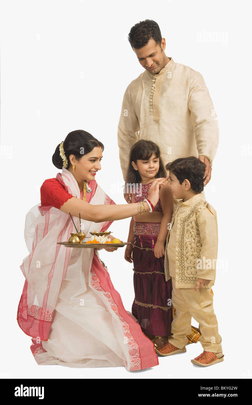 Family celebrating Durga Puja Stock Photo - Alamy