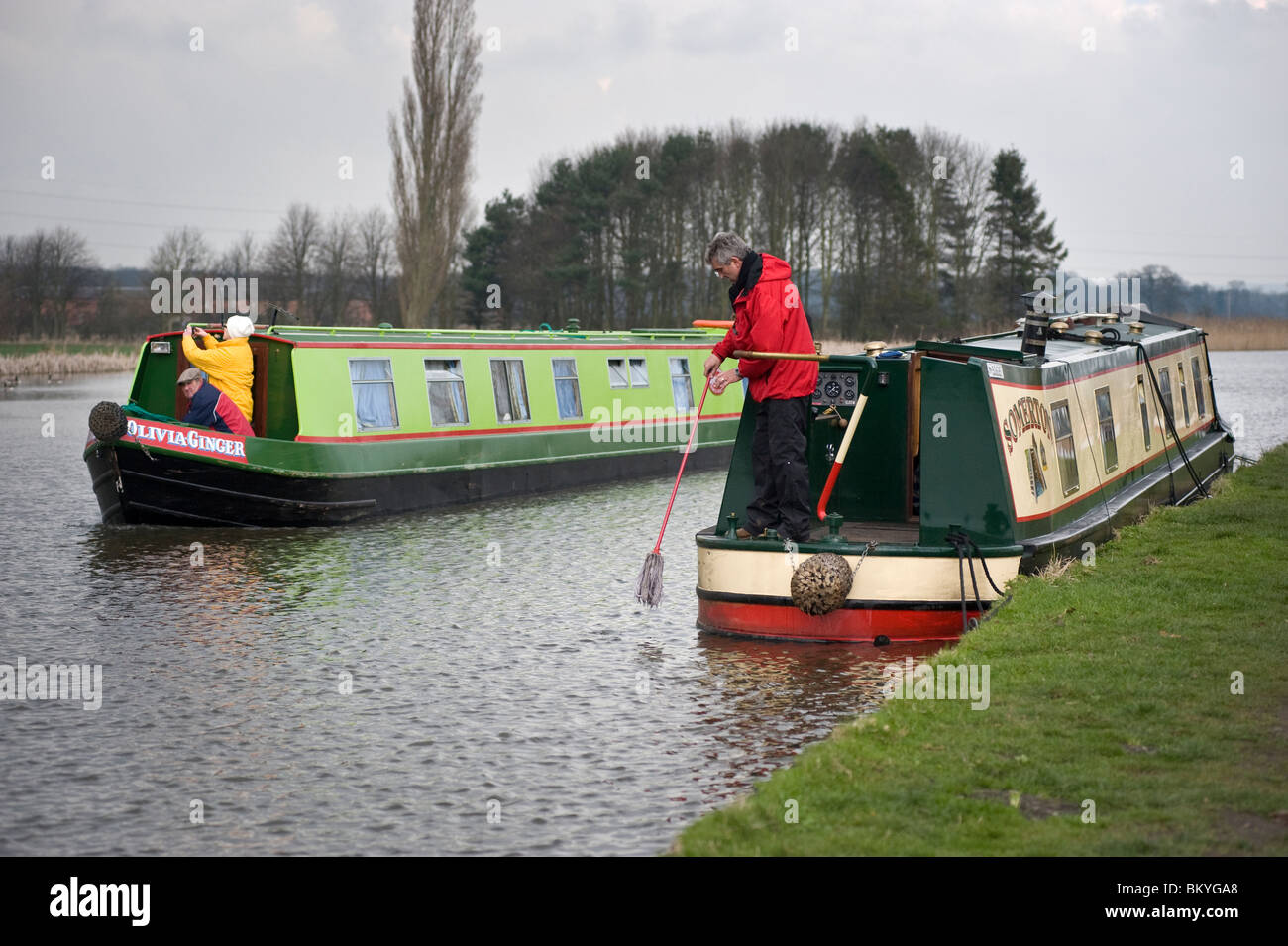 man with mop a canal boat Stock Photo - Alamy