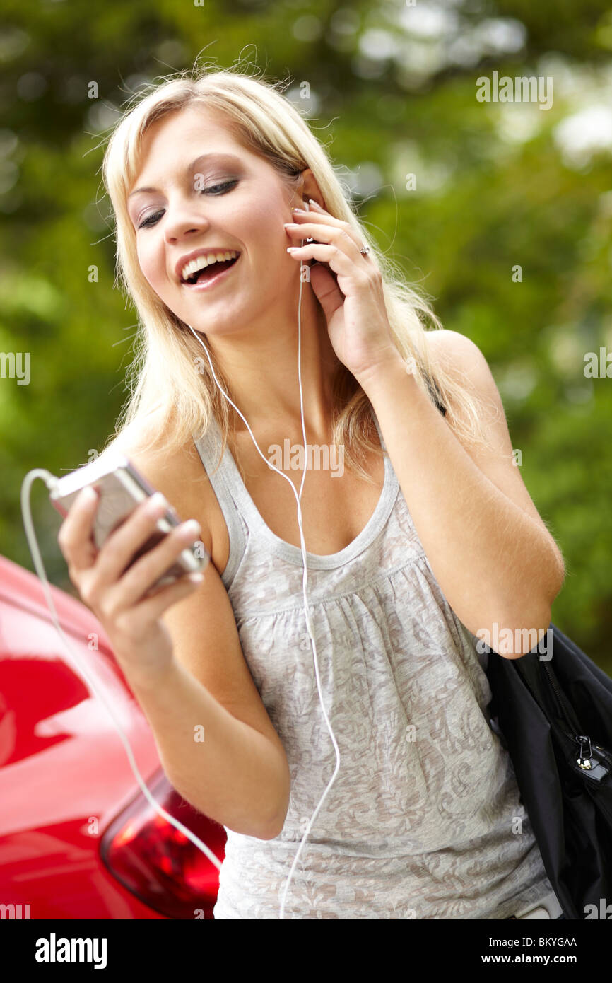 Girl listening to iPod Stock Photo - Alamy