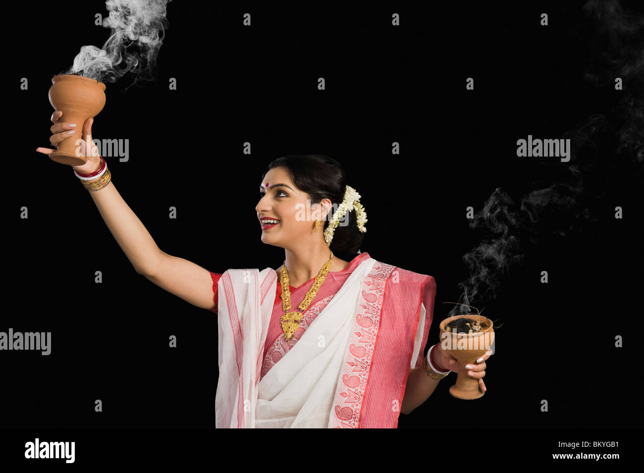 Woman praying durga puja hi-res stock photography and images - Alamy
