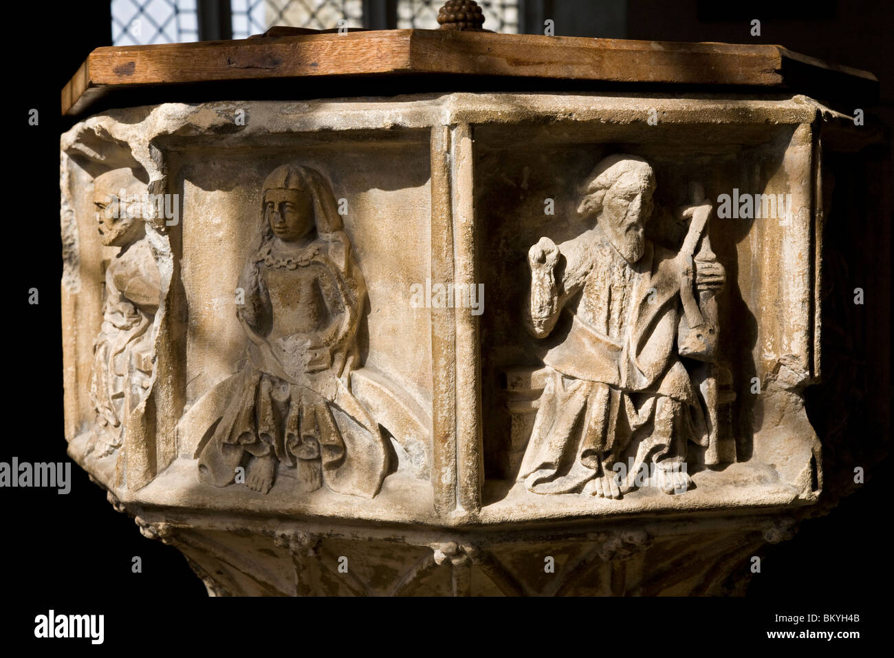 Font carving detail at the Assumption of the Blessed Virgin Mary church ...