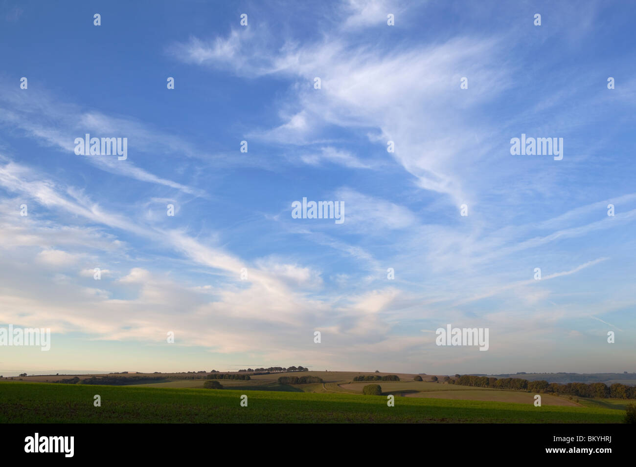 A photograph of a blue sky with fair weather cloud above the English ...