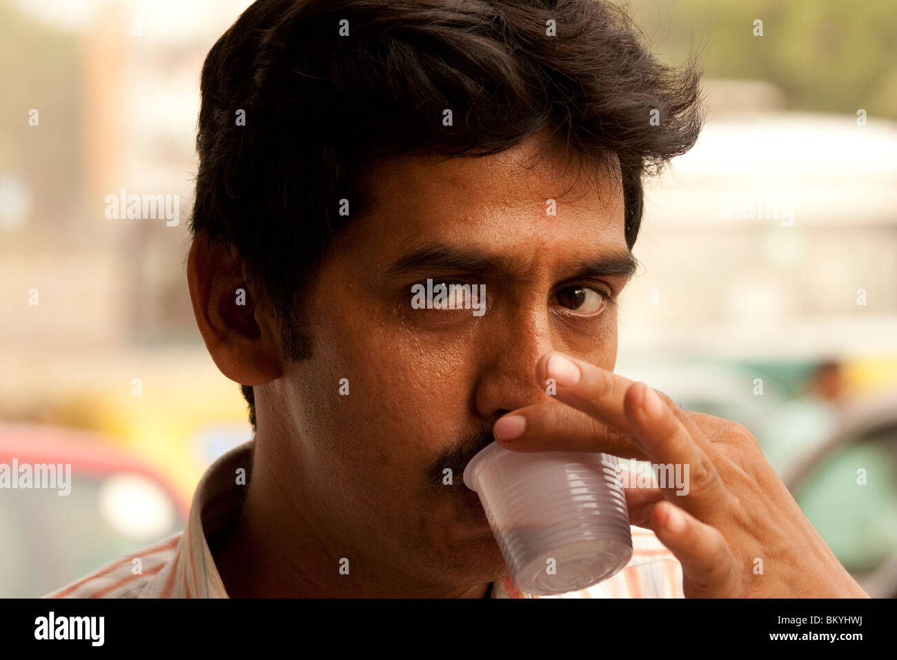 Man making indian tea in hi-res stock photography and images - Alamy