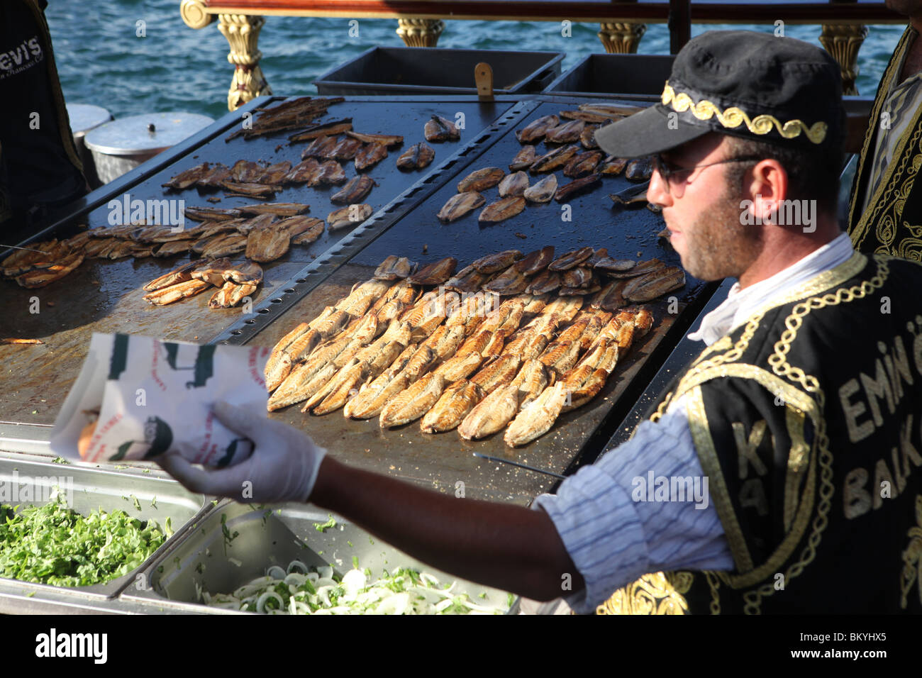 The famous boats selling grilled fish sandwiches, known locally as ...