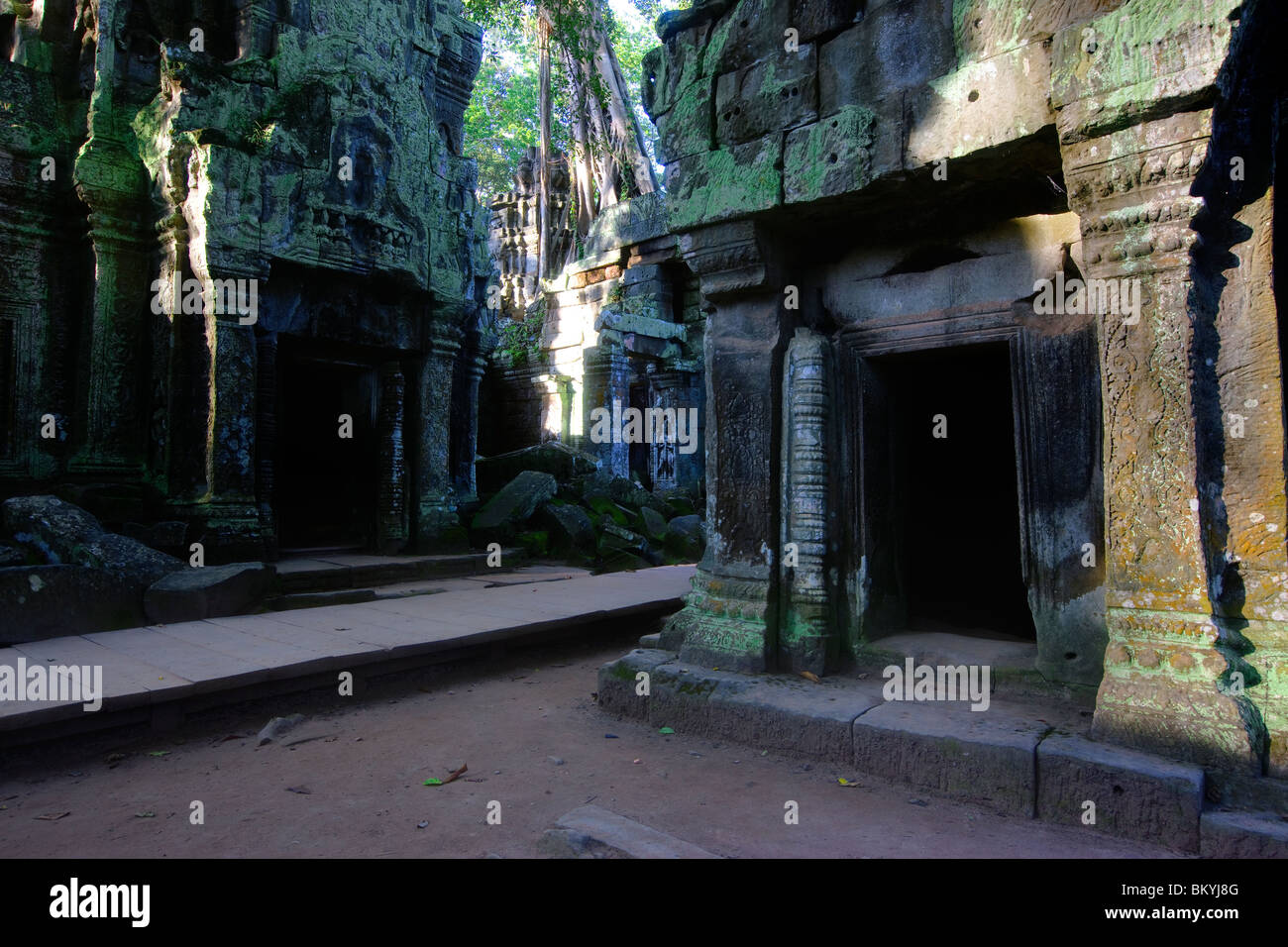 Entrance to a pair of stupas in Ta Prohm temple near Angkor Wat ...