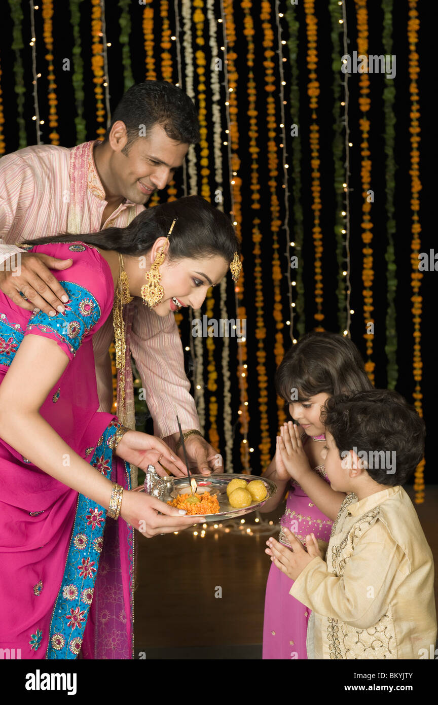 Family celebrating Diwali Stock Photo - Alamy