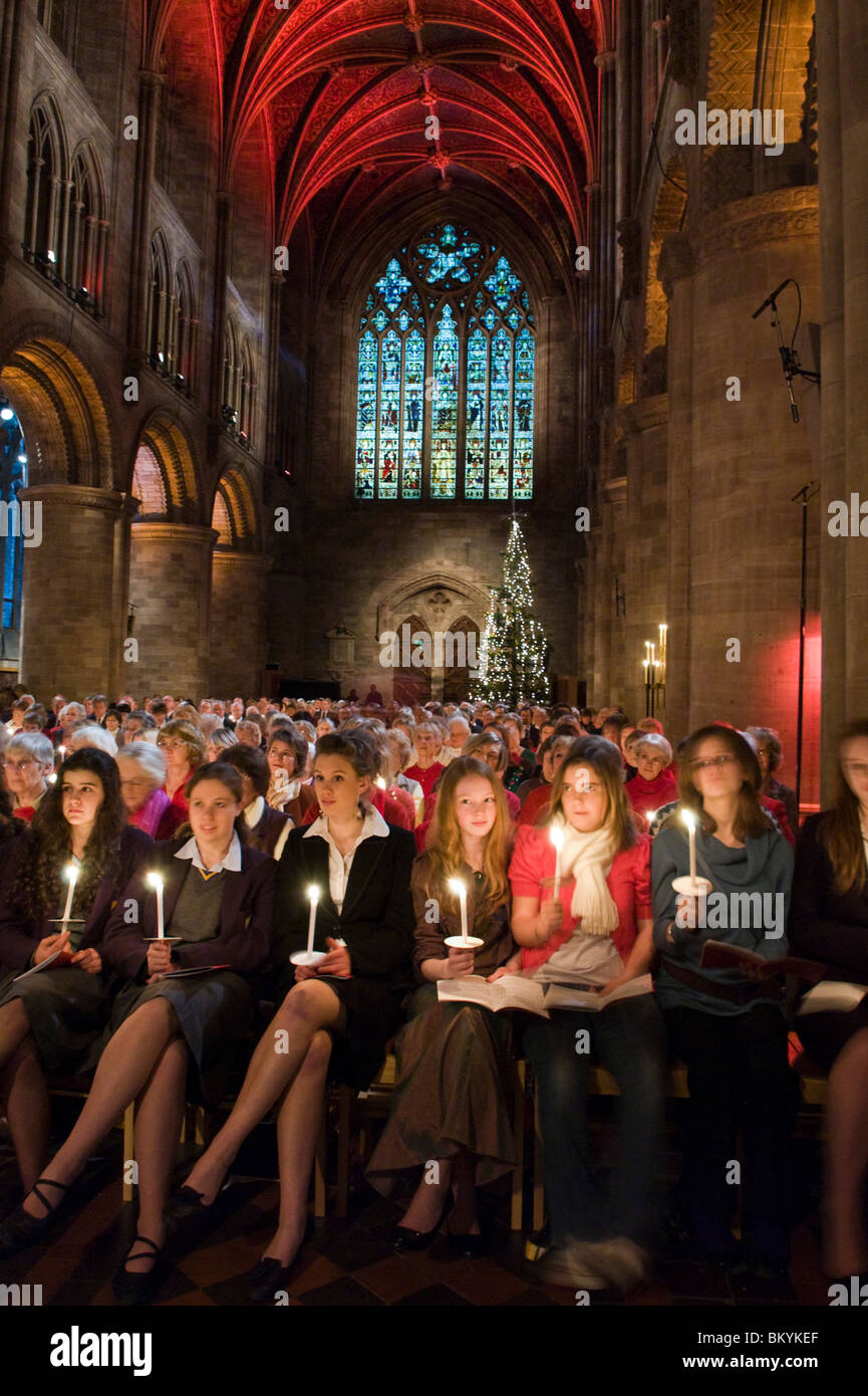 Congregation singing and holding candles during filming of BBC Songs of ...