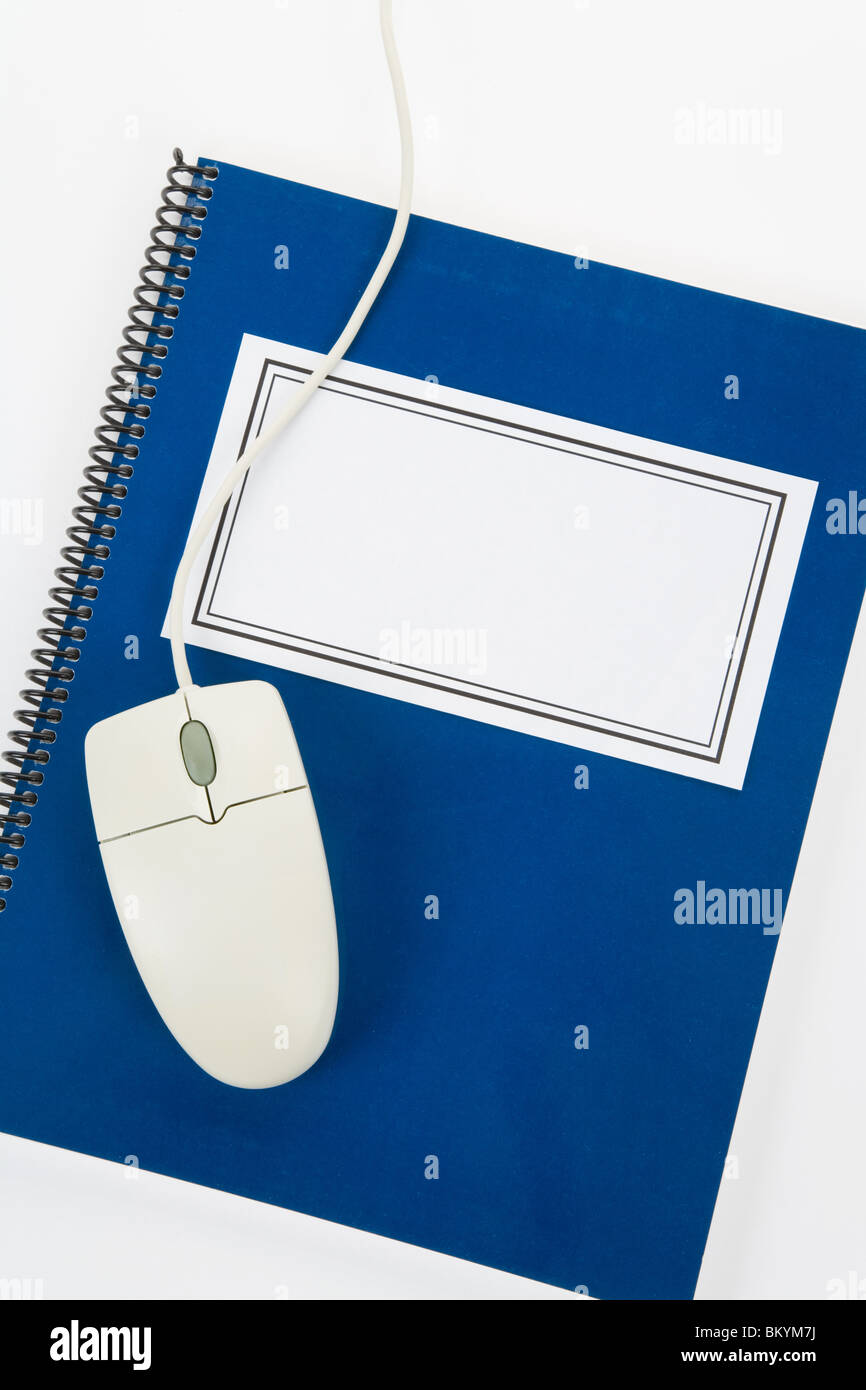 Blue school textbook and computer mouse, online learning Stock Photo ...