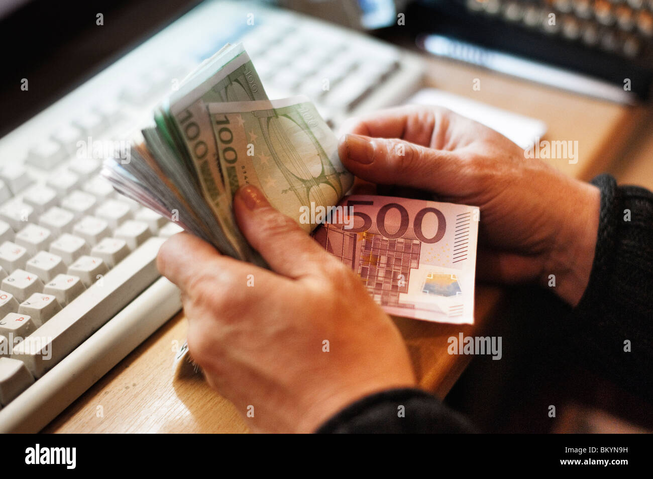 Person Counting Money Stock Photo - Alamy