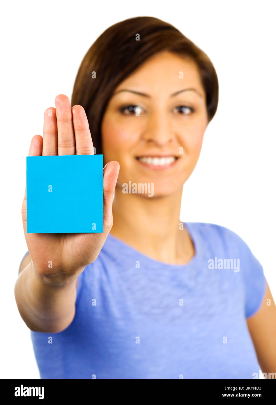Young woman has a blue sticky note on the palm of her outstretched hand ...