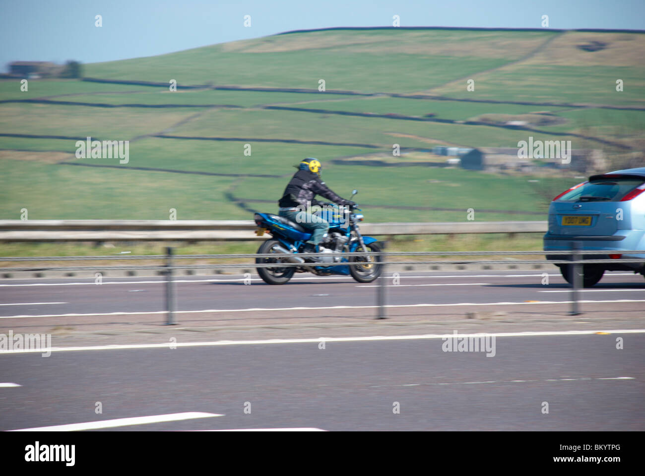 Biker on the M62 Stock Photo - Alamy