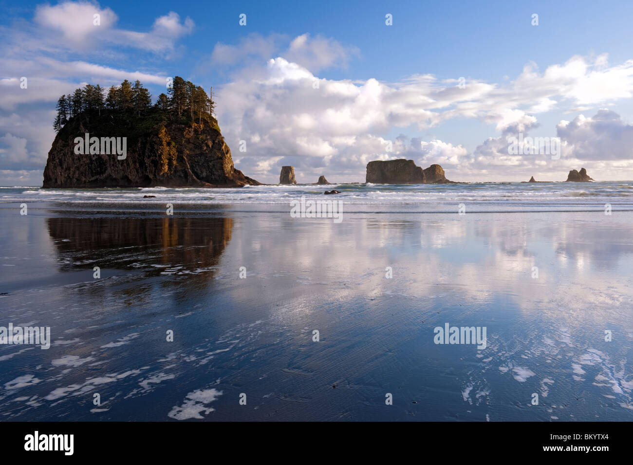 Crying Lady Rock reflects onto Washington's Second Beach with the ...