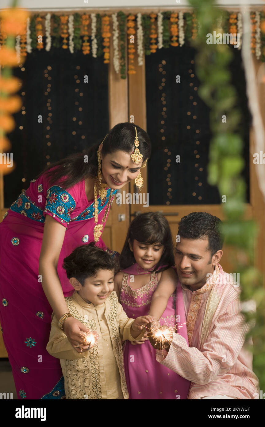 Family celebrating Diwali Stock Photo - Alamy
