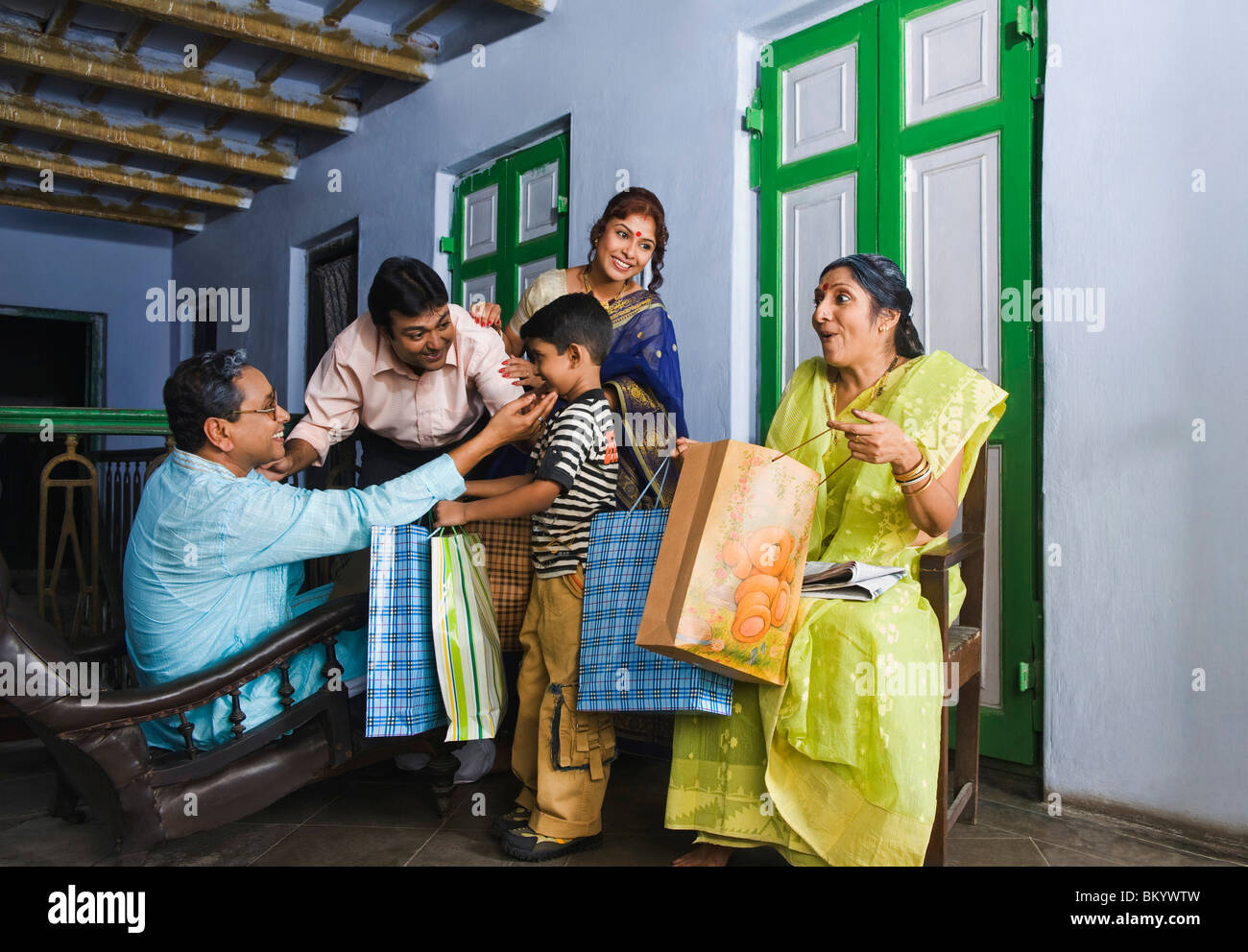 Family visiting grandparents Stock Photo - Alamy