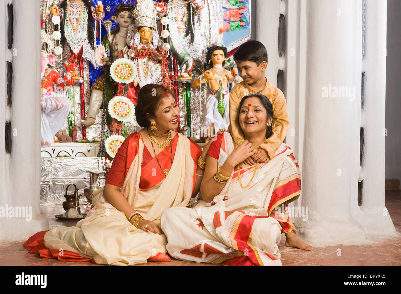 Family in a temple Stock Photo - Alamy