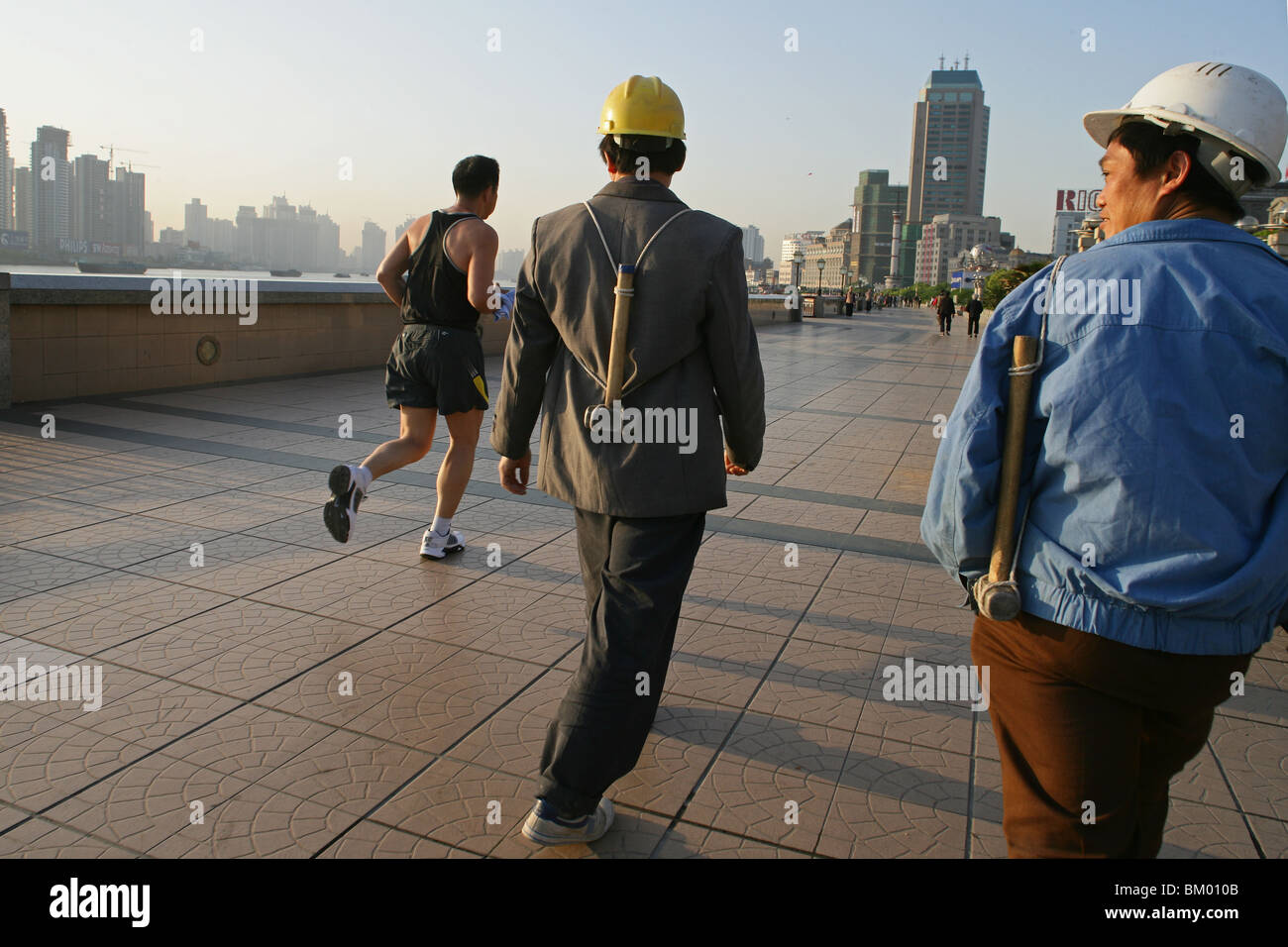 construction workers, jogger Stock Photo - Alamy